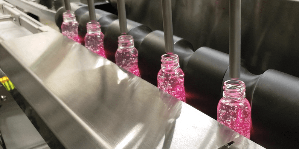 DF-100 Inline Bottle Filling Machinery - Intermittent Motion | ProSys